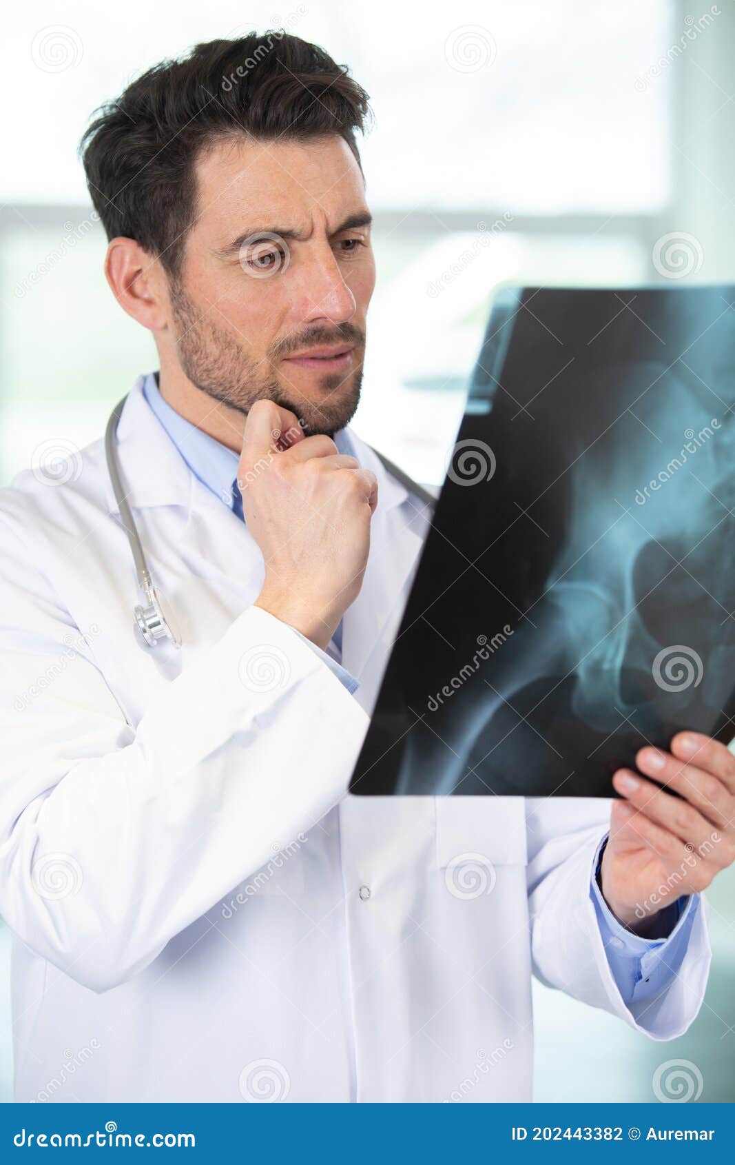 Doctor Radiologist Looking at X-ray Images Stock Photo - Image of ...