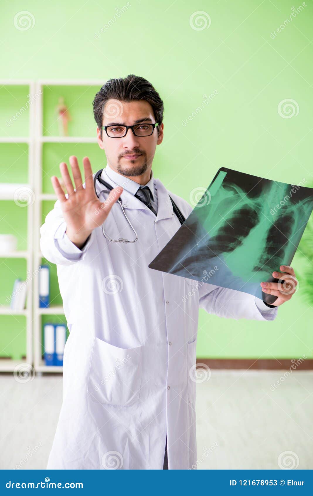 The Doctor Radiologist Looking at X-ray Scan in Hospital Stock Image ...