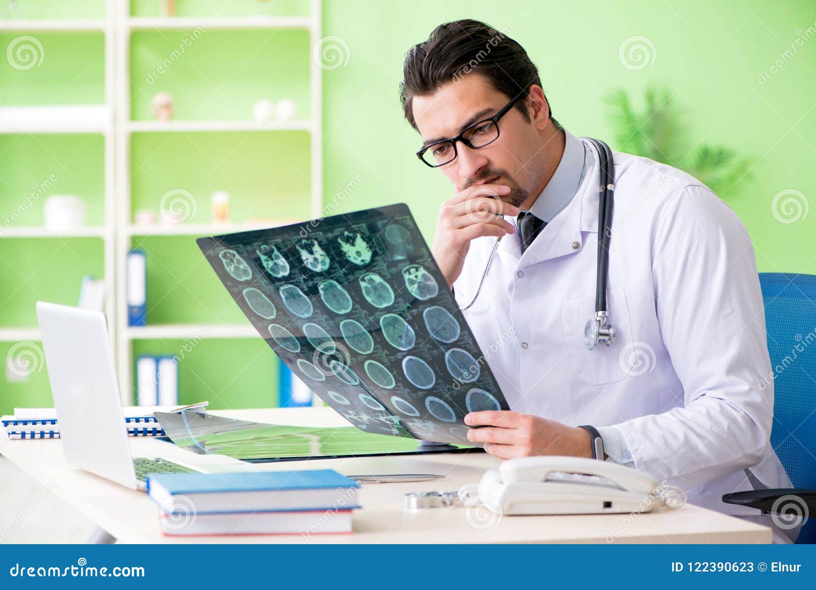 The Doctor Radiologist Looking at X-ray Scan in Hospital Stock Image ...
