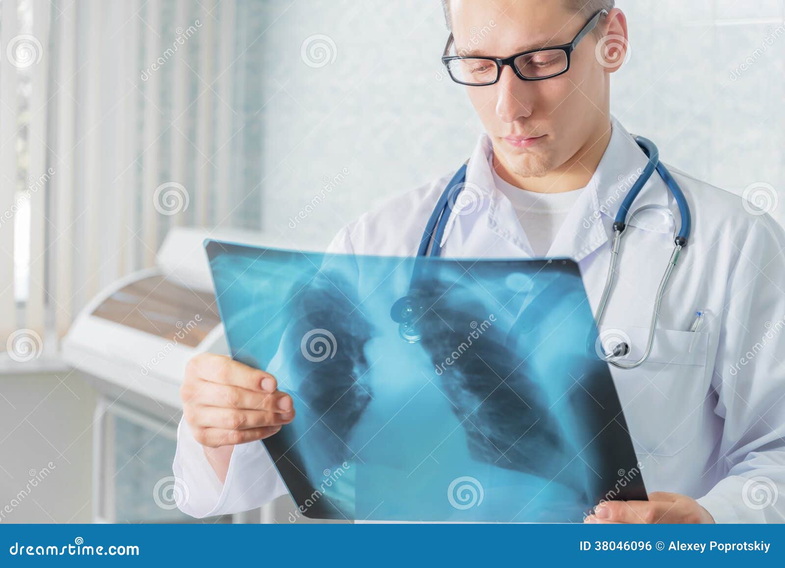 Doctor with x-ray picture stock photo. Image of analyzing - 38046096