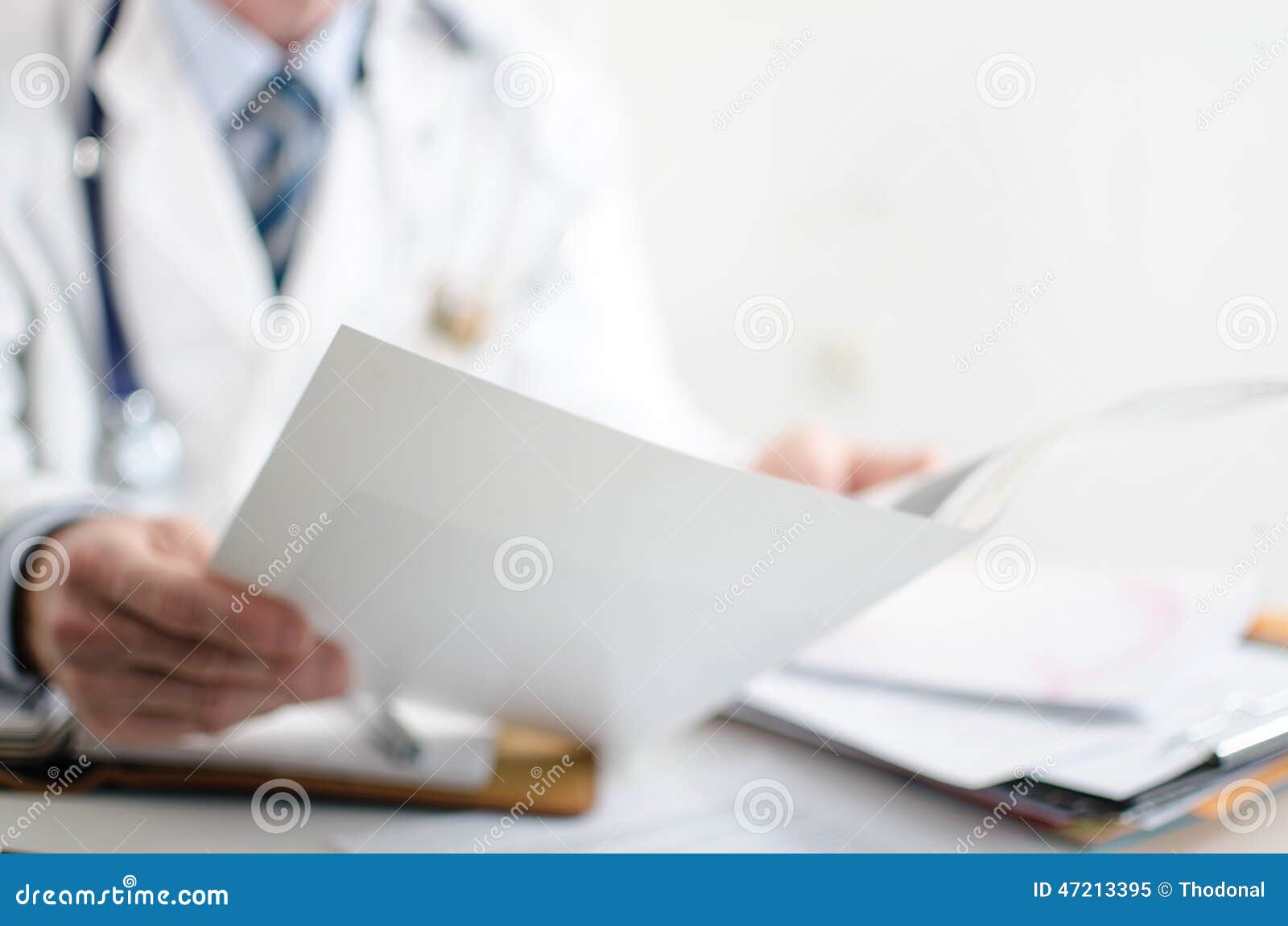 Doctor Reading Medical Notes Stock Image - Image of healthcare ...