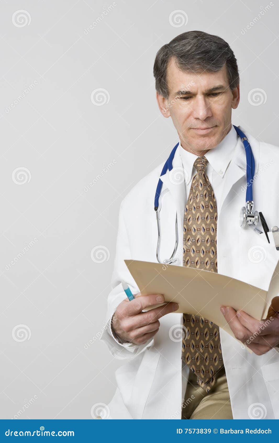 Doctor Reading Patient S Chart Stock Image - Image of reviewing ...