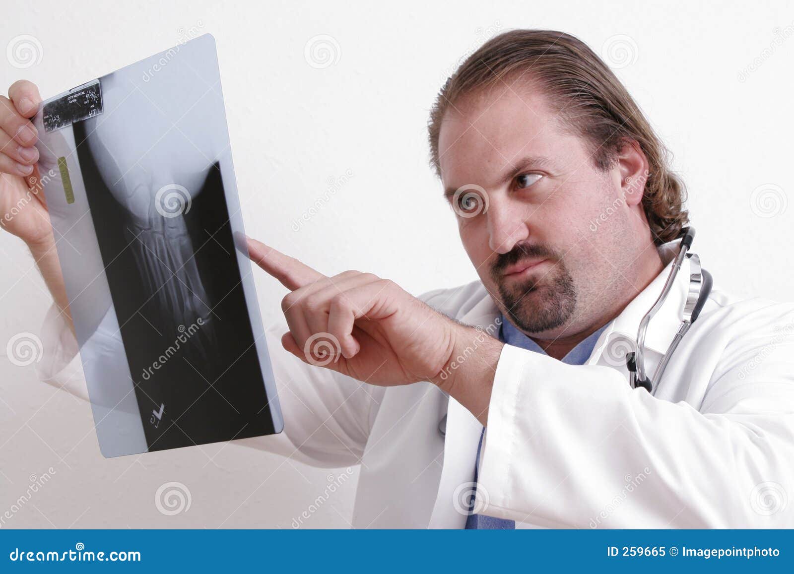 Doctor reading an x-ray stock image. Image of doctor, radiology - 259665