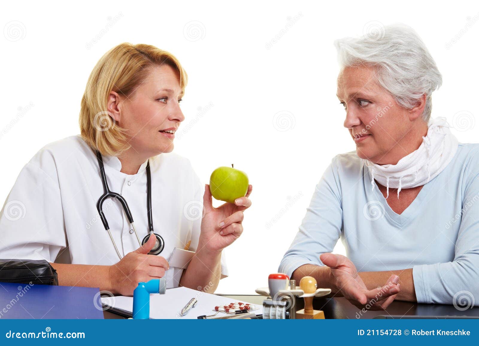 Doctor Recommending Apple To Senior Stock Photo - Image of diagnose ...