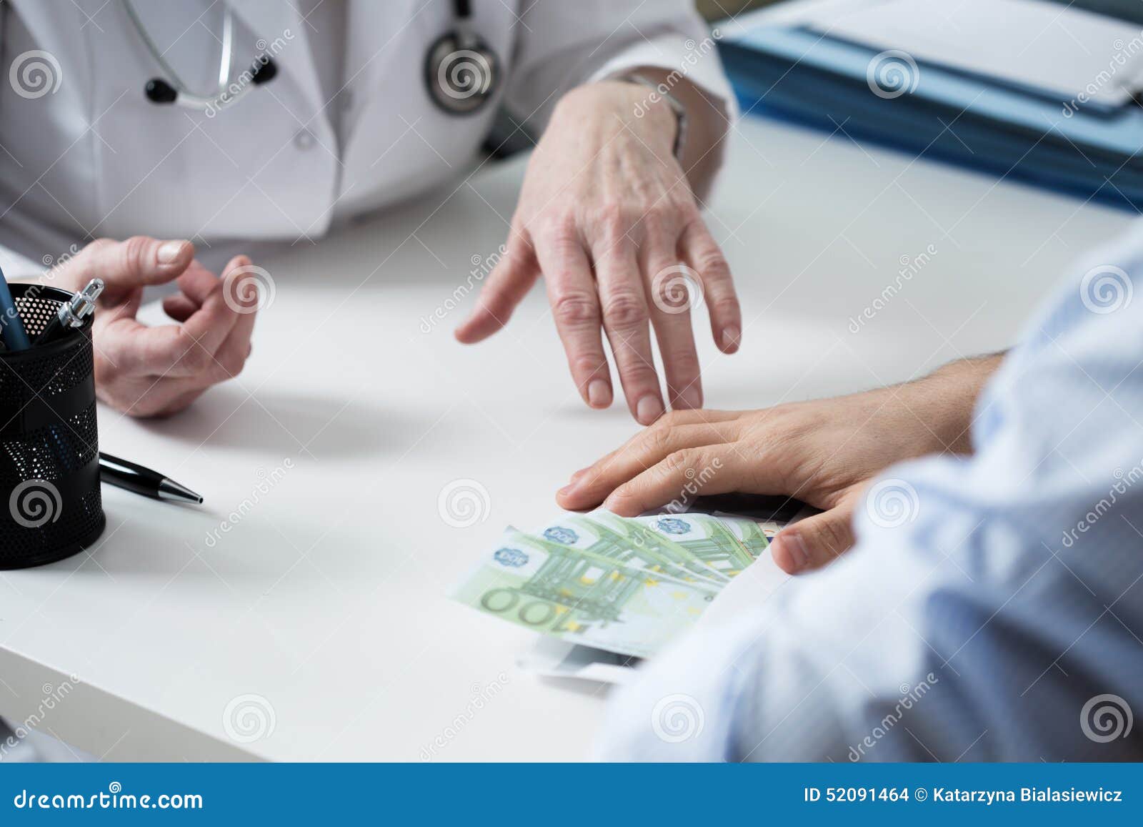 Doctor refusing a bribe stock photo. Image of medic, intern - 52091464