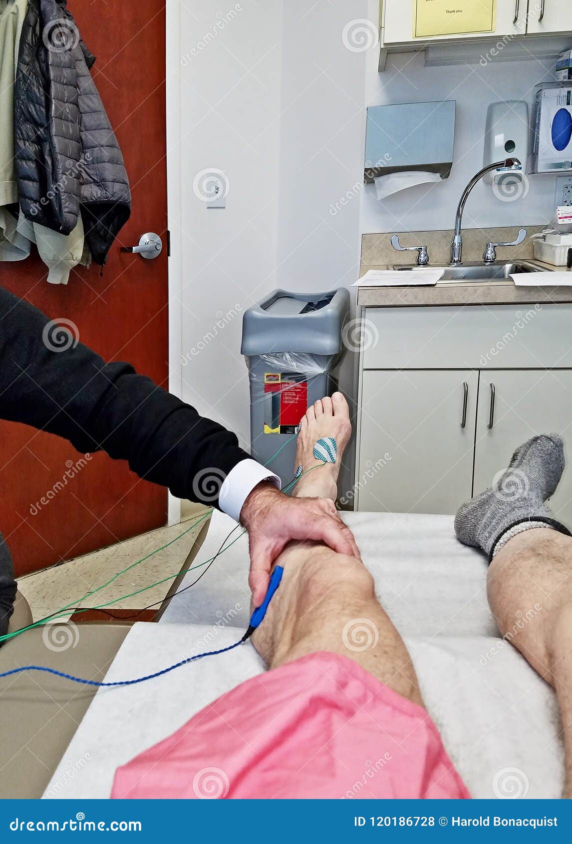 Man Undergoing EMG Test in Doctor`s Office Stock Photo - Image of ...