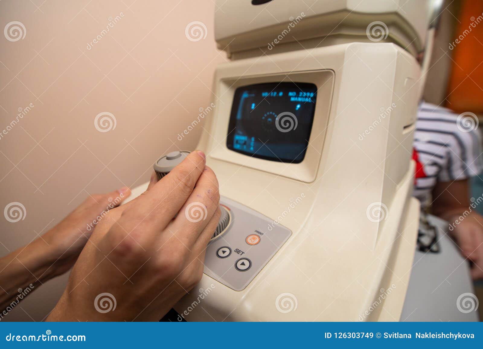The Doctor`s Hands Control the Apparatus for Testing the Vision Behind ...