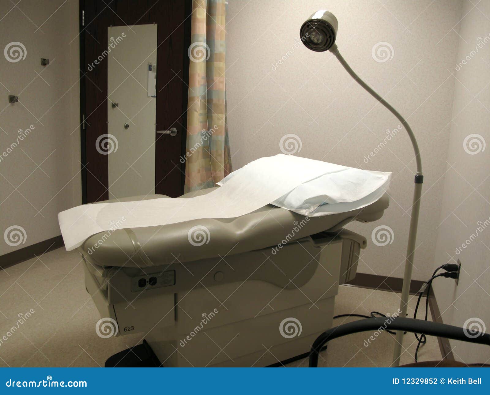 Doctor s Office Exam Table stock photo. Image of doctors - 12329852