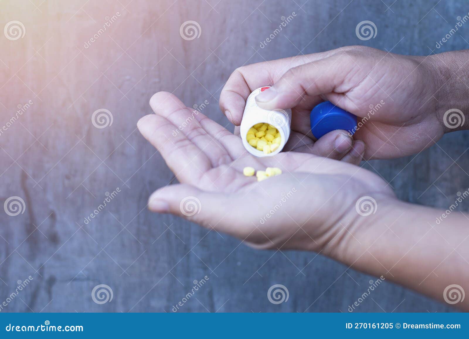 Doctor S Pouring Yellow Tablets in the Palm for a Patient Stock Image ...