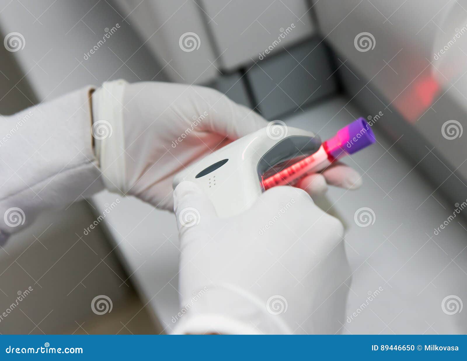 Doctor Scanning Data from Tube Stock Photo - Image of laser, hospital ...