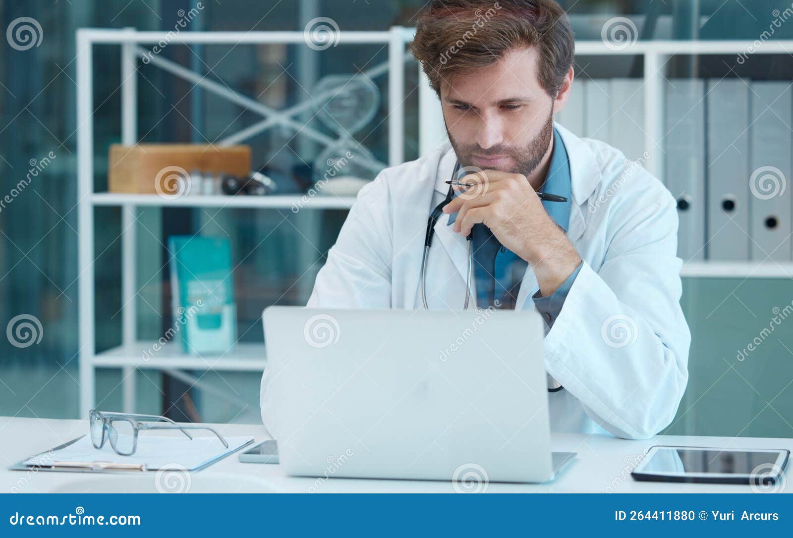 Doctor, Scientist and Laptop with a Man Reading and Thinking while ...