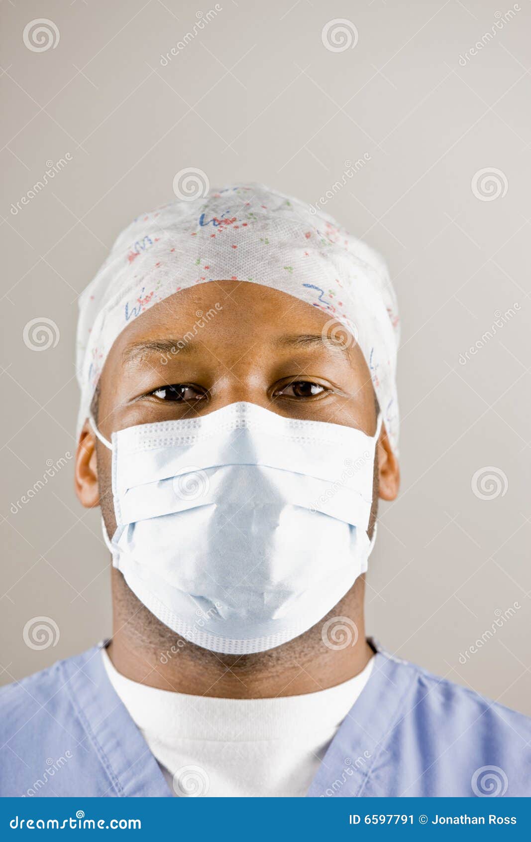 Doctor in Scrubs, Surgical Mask and Surgical Cap Stock Image - Image of ...