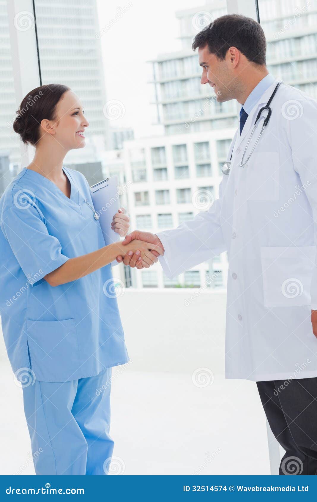 Doctor Shaking Hands with His New Surgeon Stock Photo - Image of happy ...