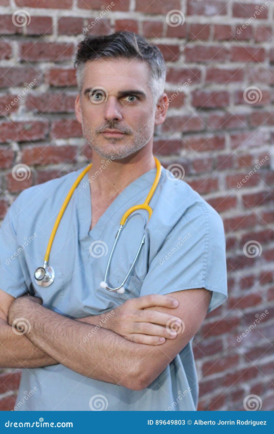 Doctor with Shocked Expression and Arms Crossed Stock Image - Image of ...