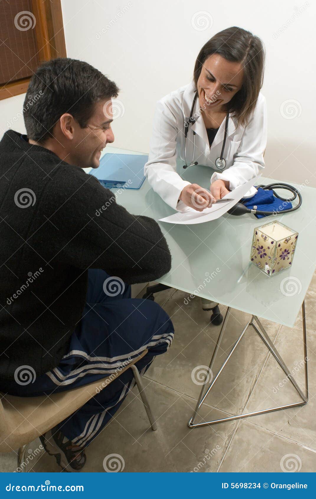 Doctor Showing Information To Patient - Vertical Stock Photo - Image of ...