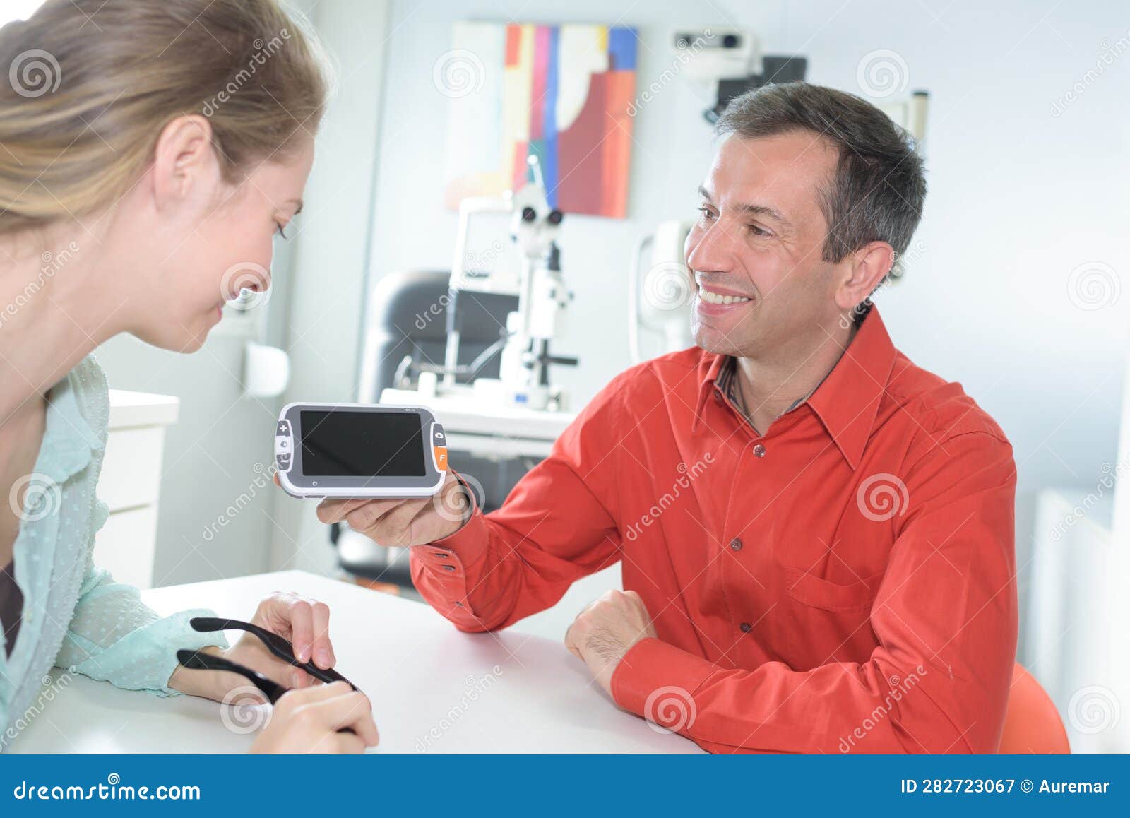 Doctor Showing Patient Machine Stock Image - Image of automatic, people ...