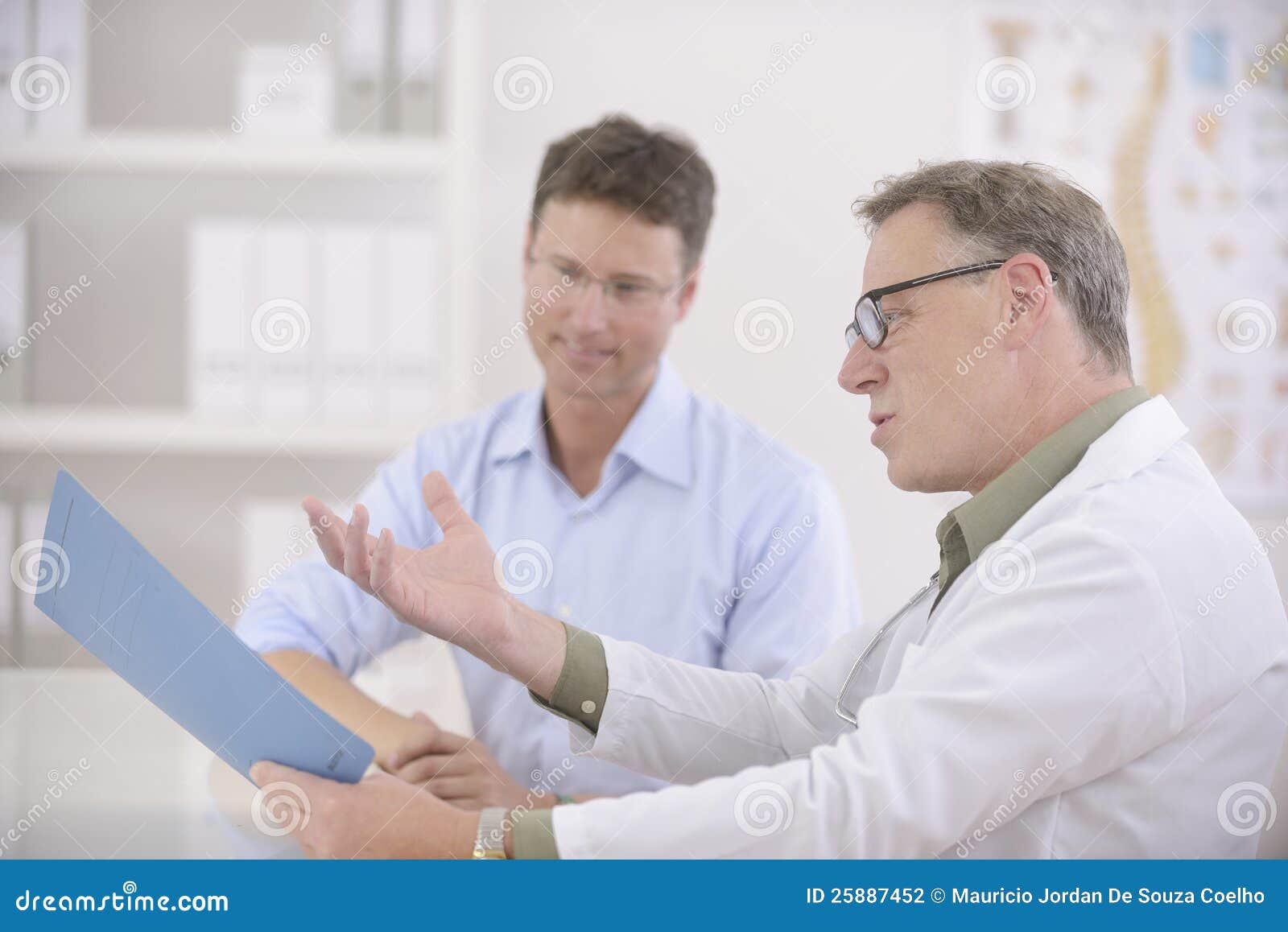 Doctor Showing Results To Patient Stock Photo - Image of mature ...
