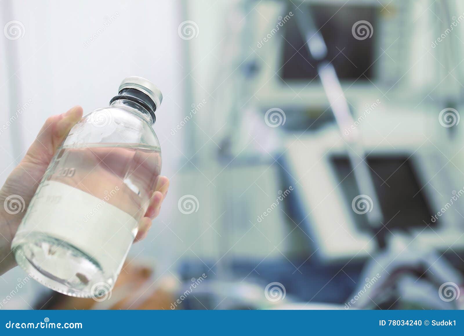 Doctor Shows a Bottle with a Solution Stock Photo - Image of medicine ...