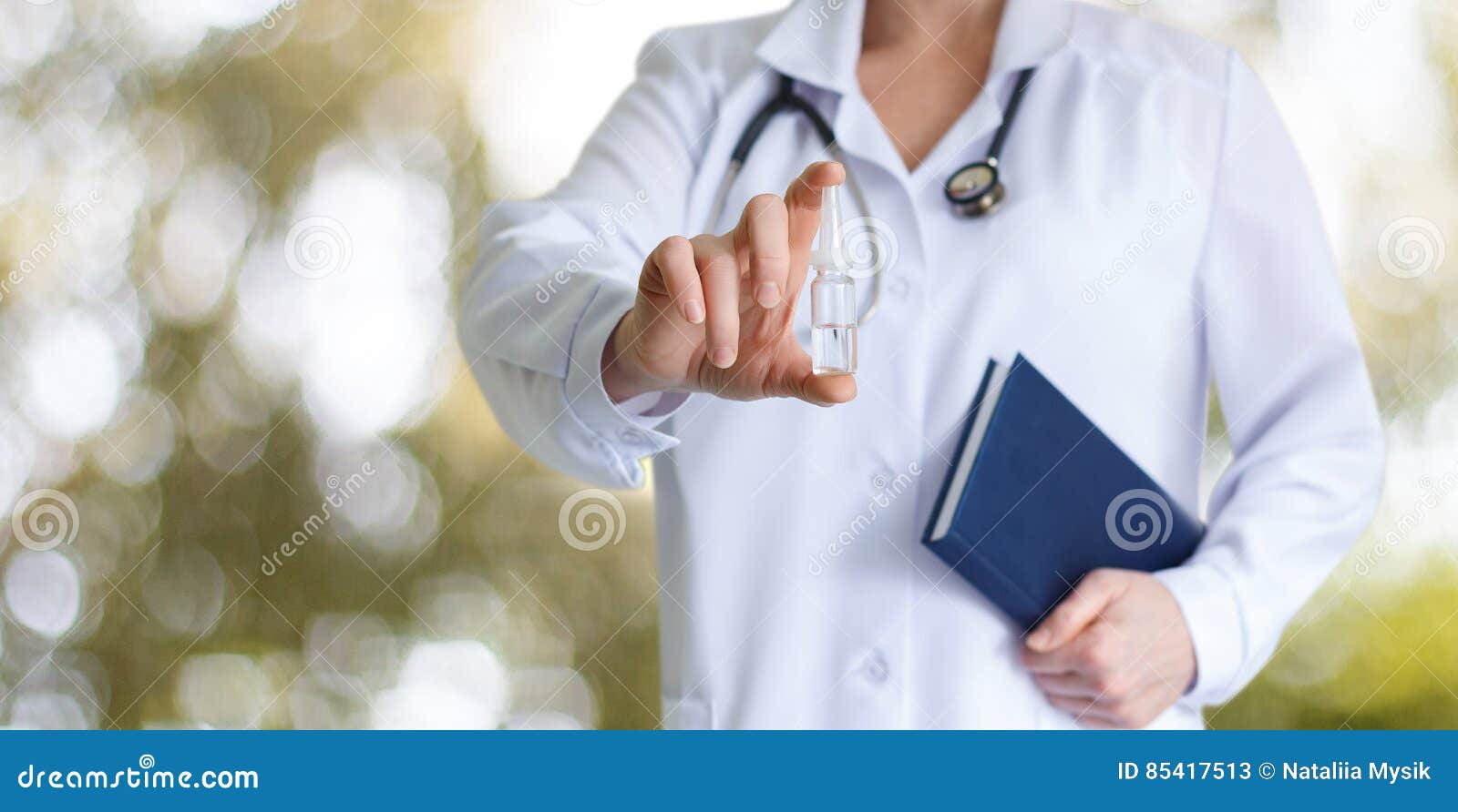 Doctor Shows a Tube with a Cure. Stock Image - Image of giving ...