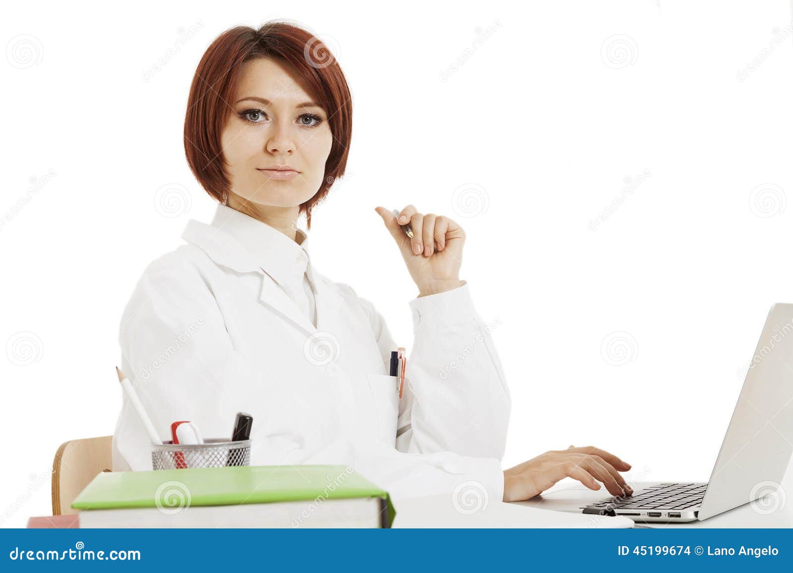 Doctor Sitting Behind Her Desk Stock Photo - Image of woman, computer ...