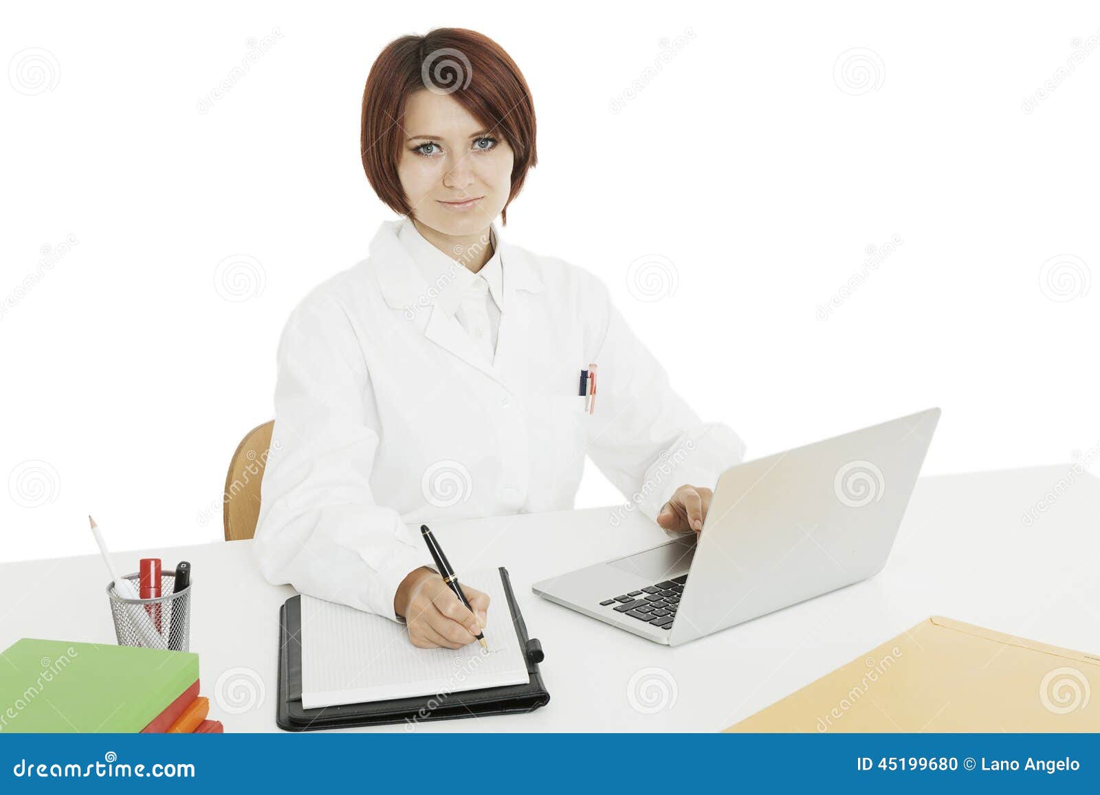 Doctor Sitting Behind Her Desk Stock Photo - Image of table, computer ...