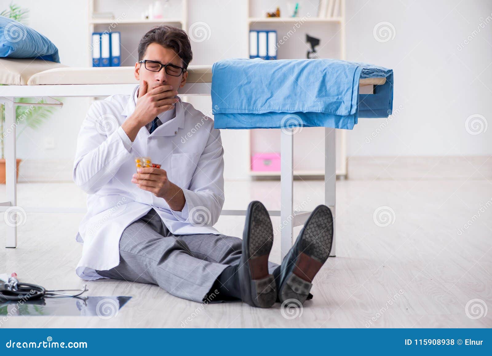 The Doctor Sitting on the Floor in Hospital Stock Photo - Image of ...