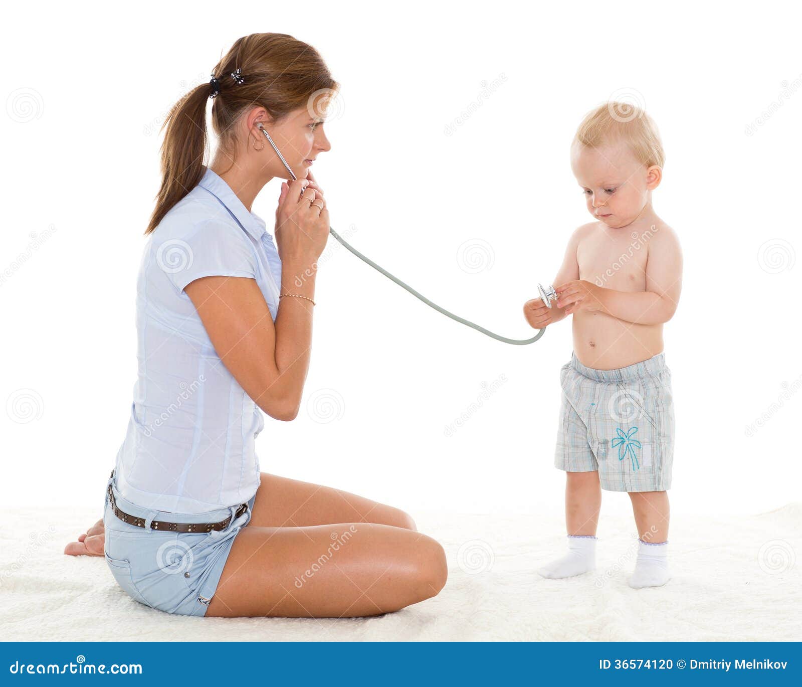 Doctor and small patient stock photo. Image of examination - 36574120
