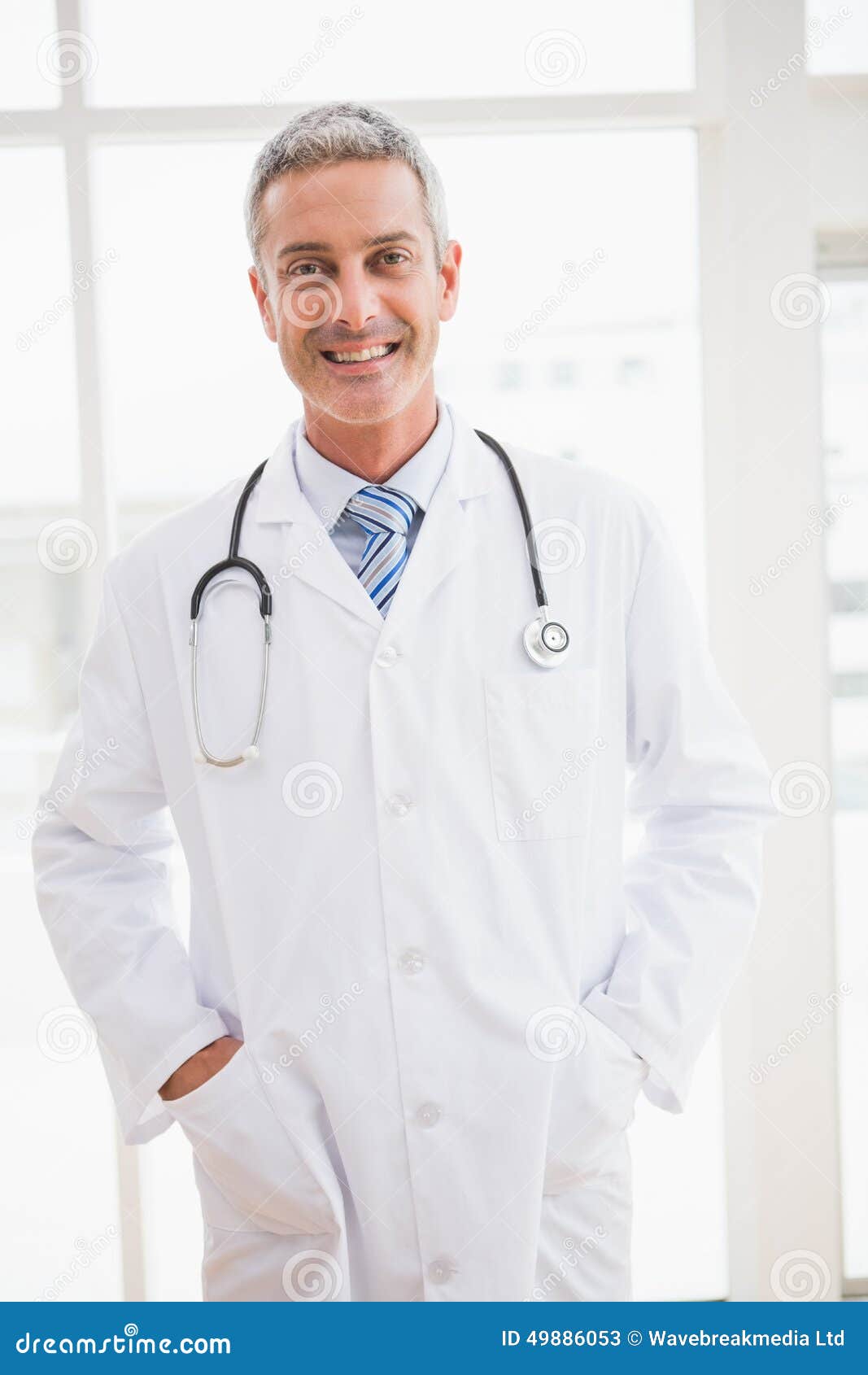Doctor smiling at camera stock image. Image of service - 49886053