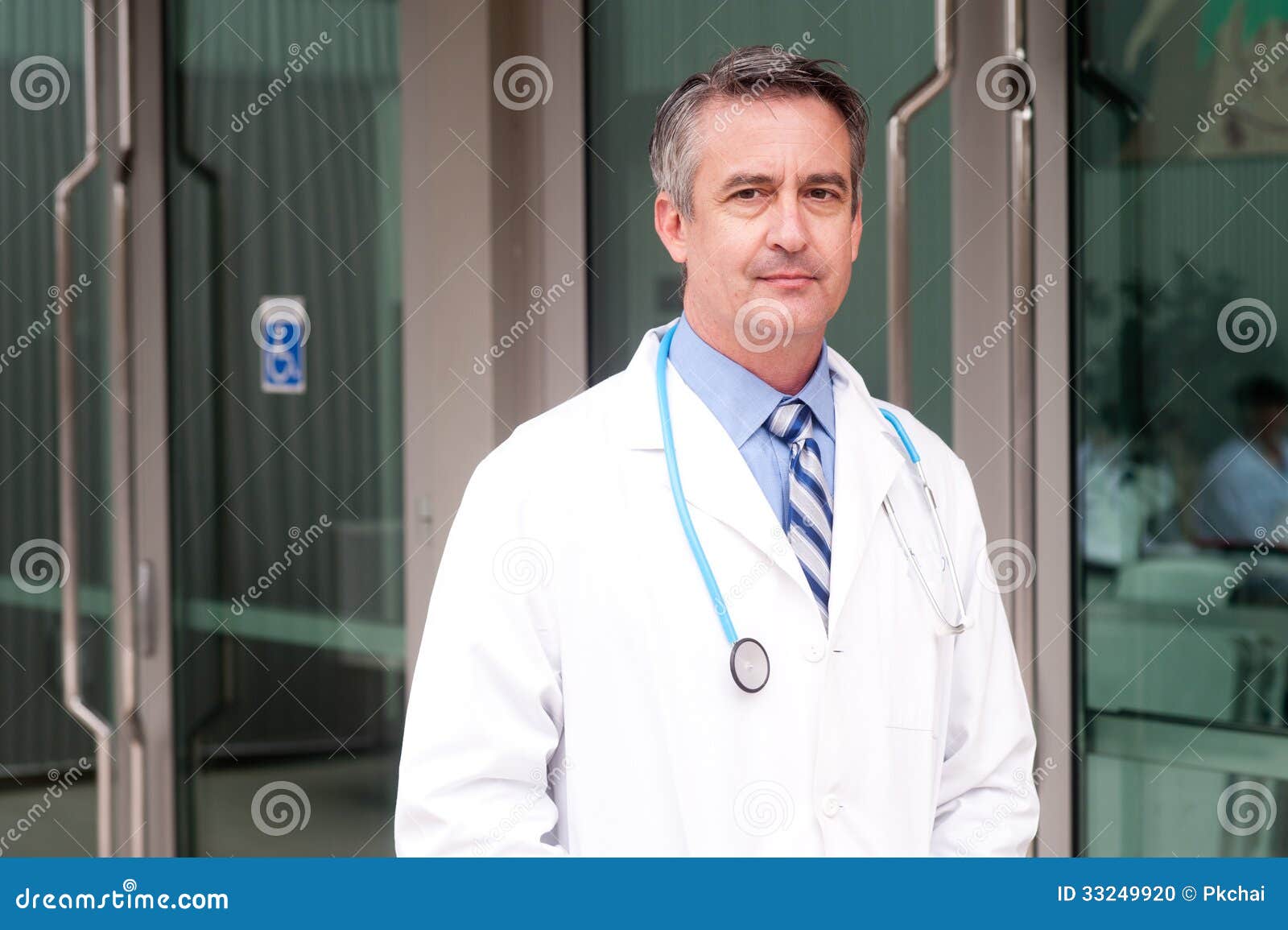 Doctor smiling in hospital stock photo. Image of medical - 33249920