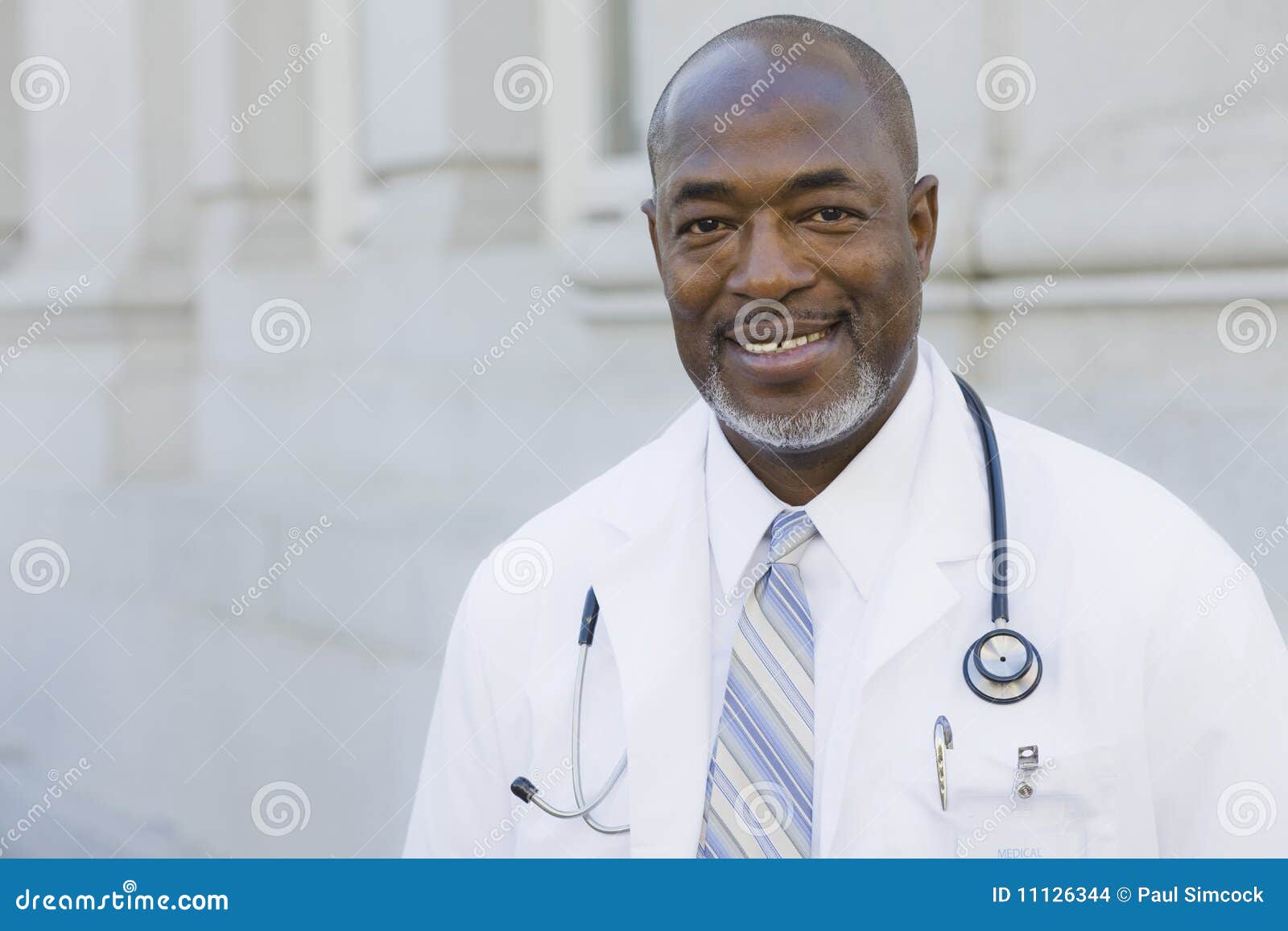 Doctor Smiling To Camera stock photo. Image of outside - 11126344