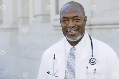 Doctor Smiling To Camera stock photo. Image of outside - 11126344