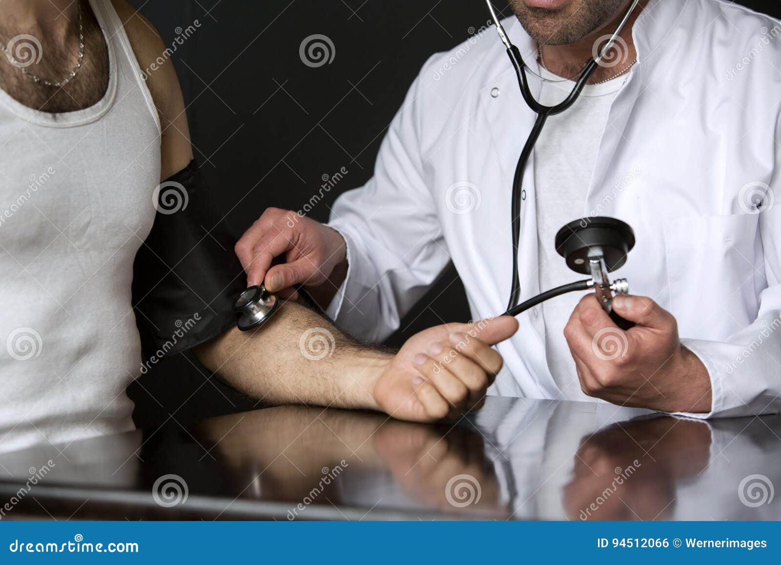 Doctor with Sphygmomanometer Checking Pulse from Patient Stock Photo ...