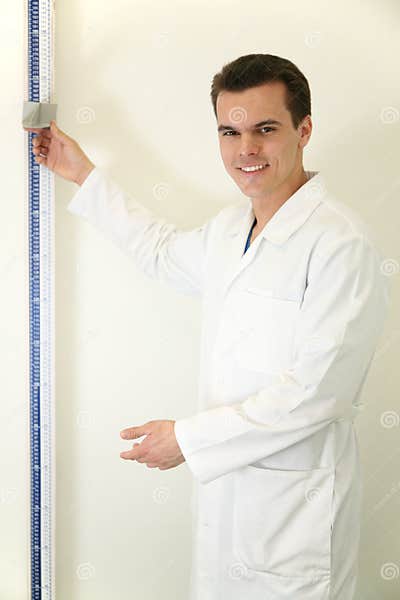 Doctor with stadiometer stock photo. Image of laboratory - 2229134