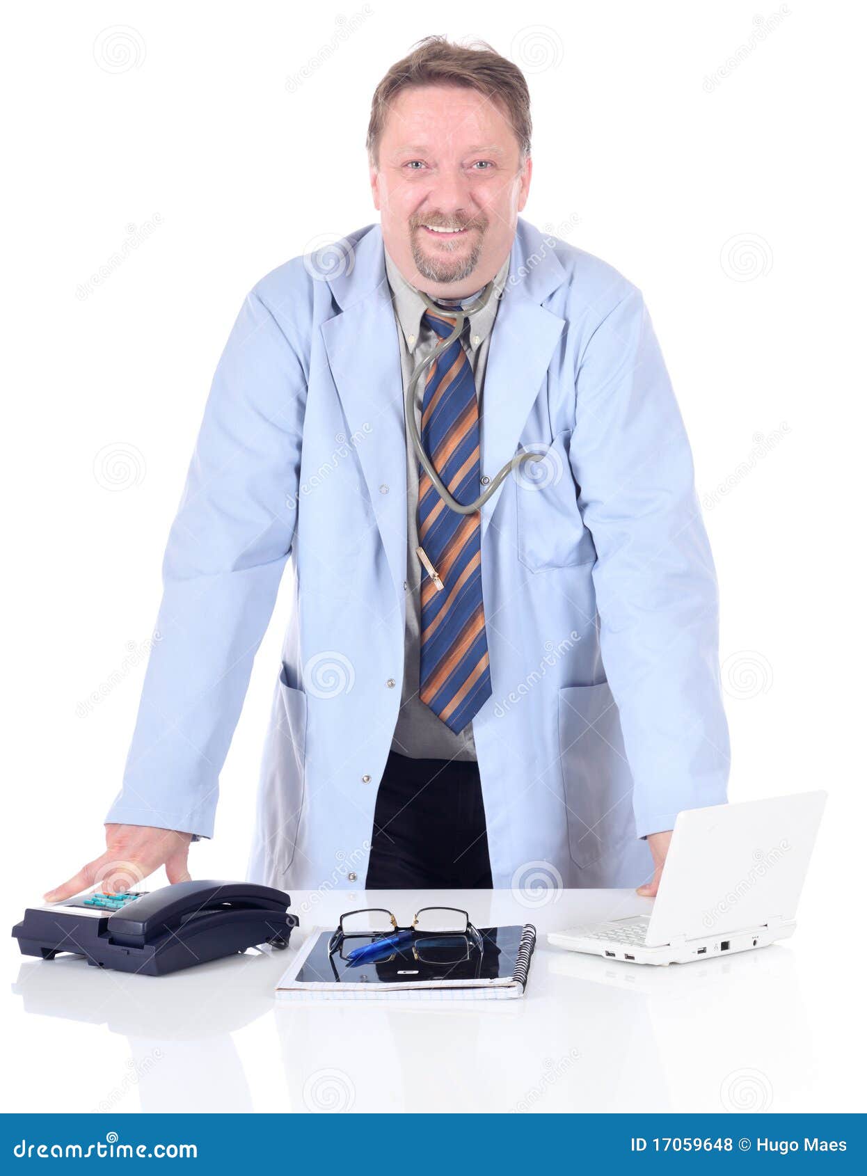 Doctor standing at desk stock photo. Image of silo, medical - 17059648