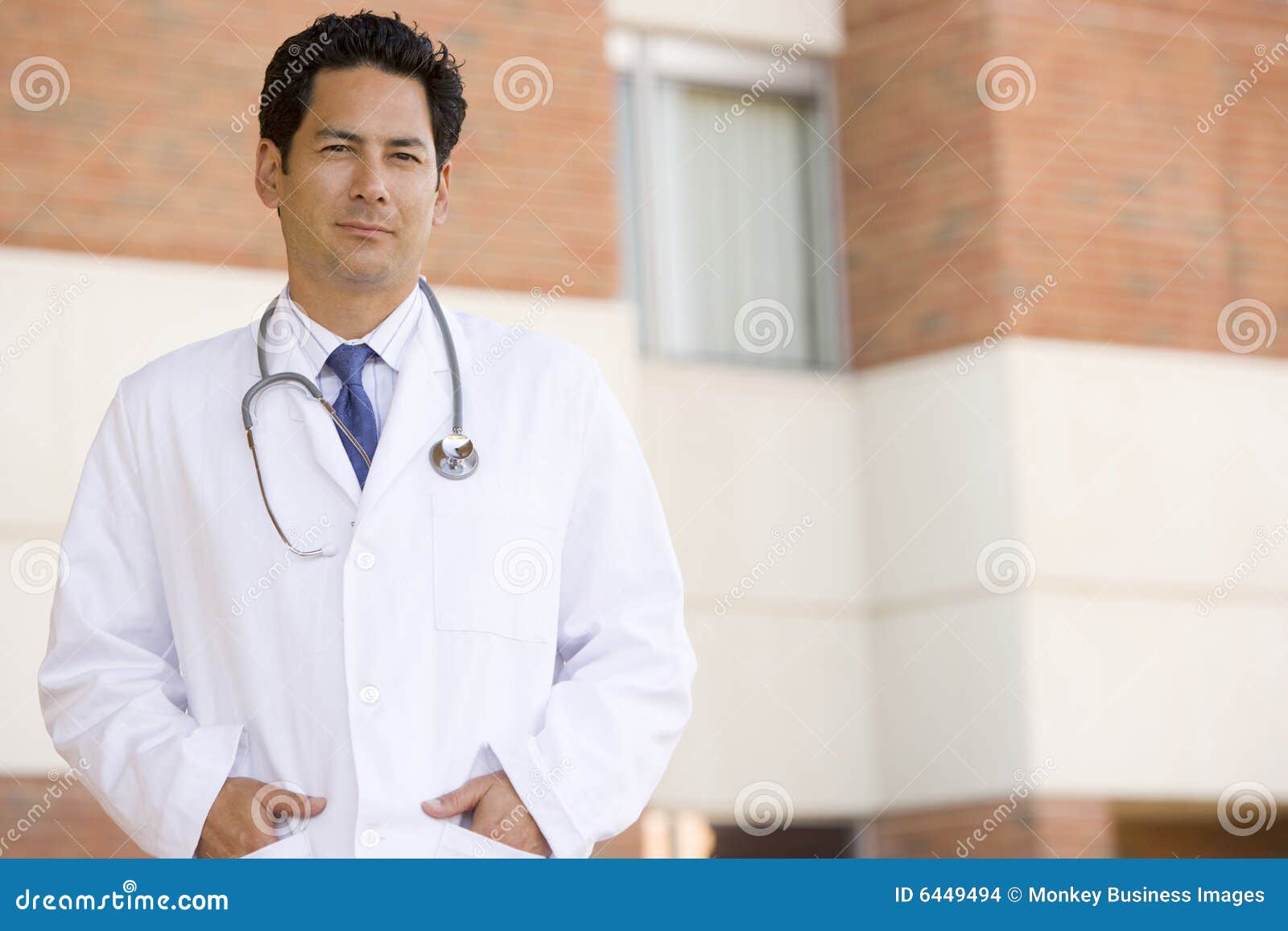 Doctor Standing Outside a Hospital Stock Photo - Image of smiling, coat ...
