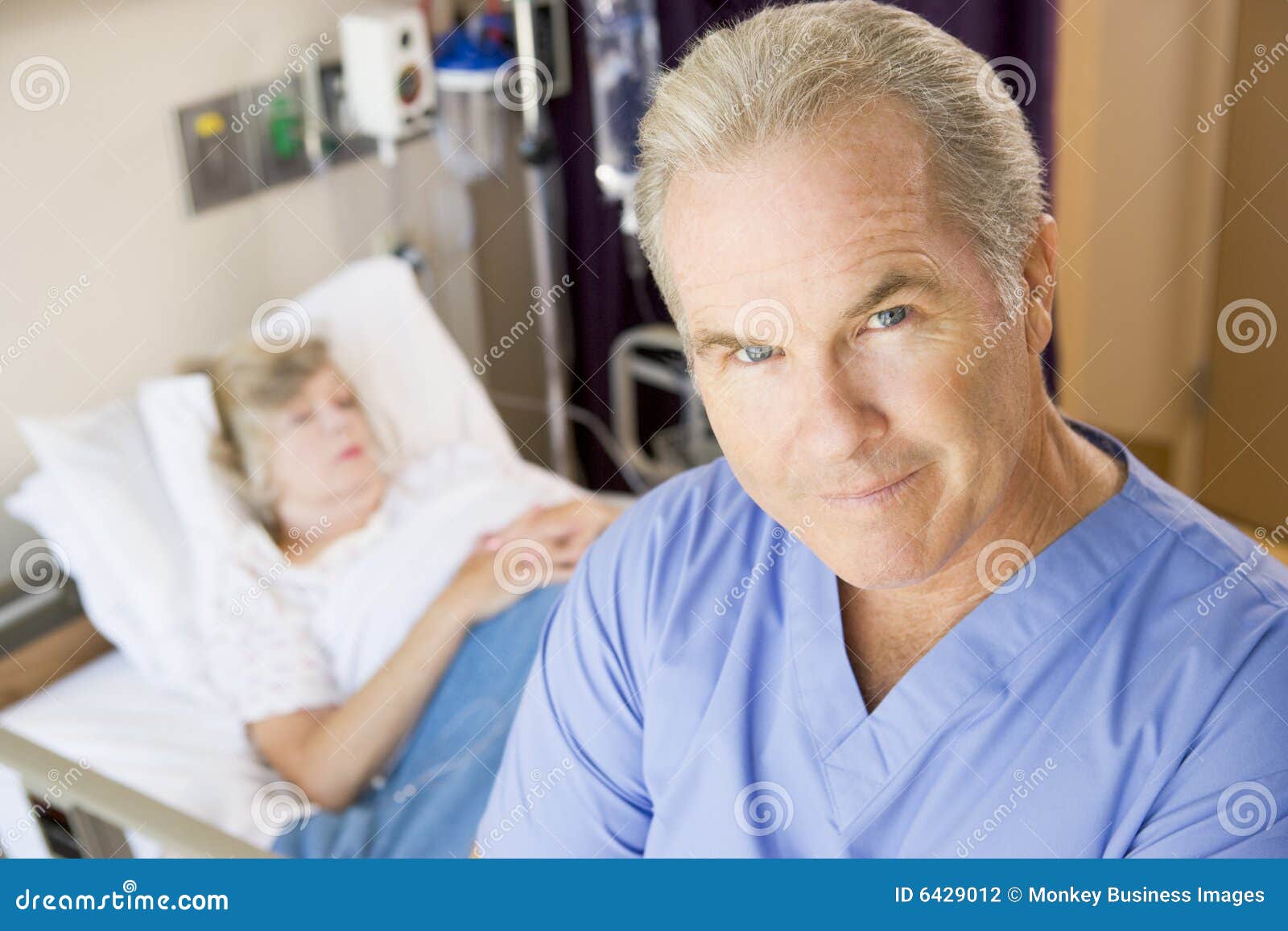 Doctor Standing in Patients Room,Looking Serious Stock Photo - Image of ...