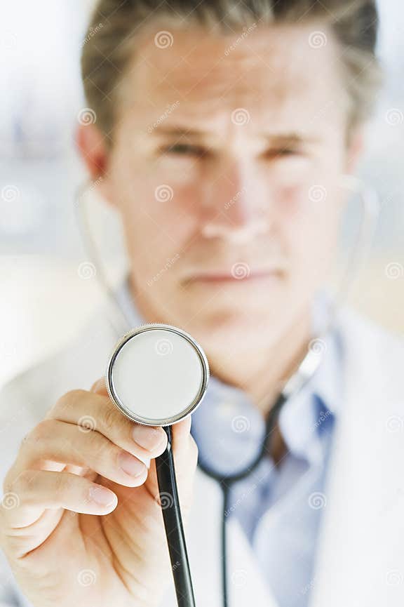 Doctor with stethescope stock image. Image of healthcare - 6991191