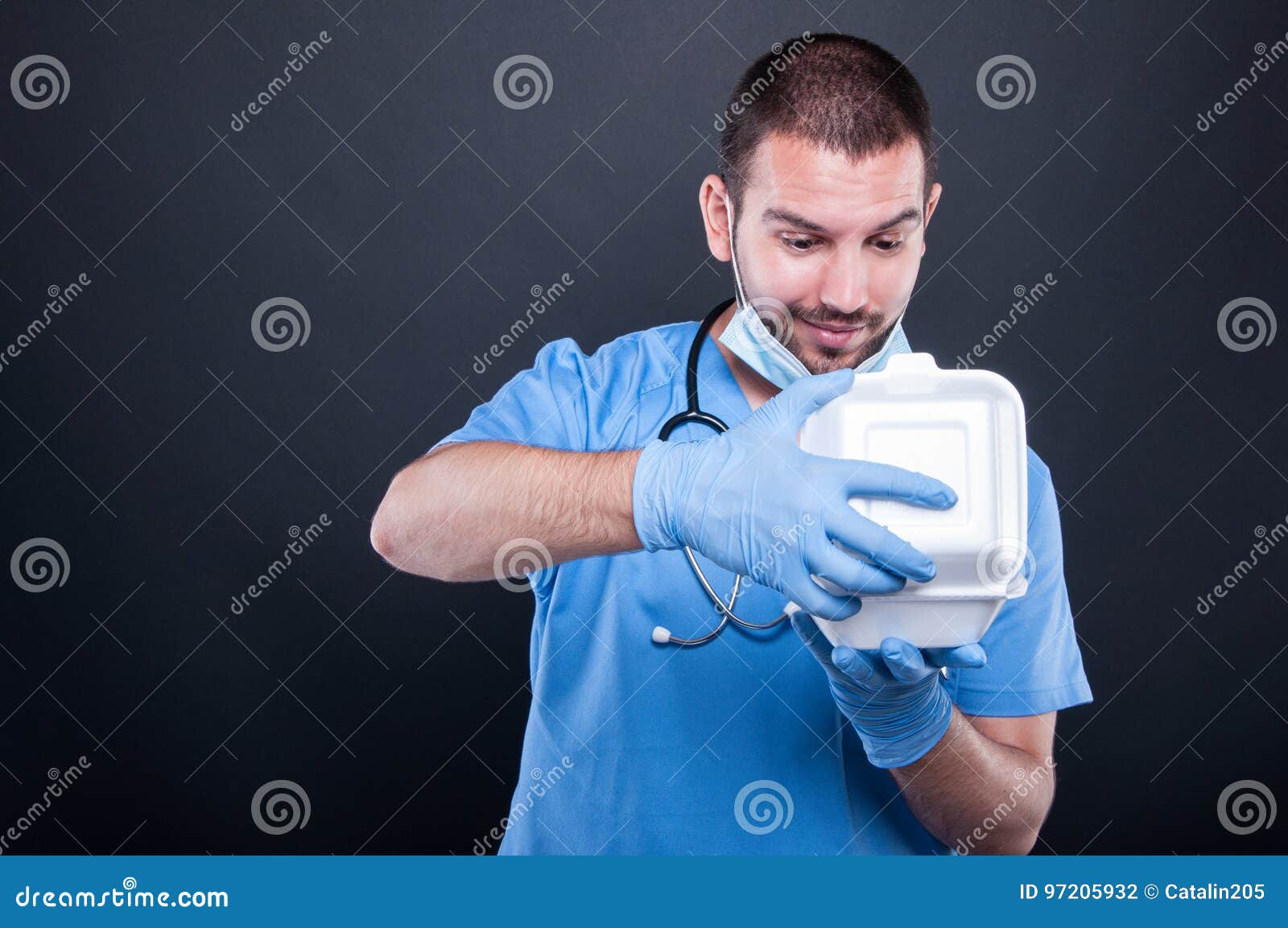Doctor with Stethoscope Looking Happy at His Lunch Box Stock Photo ...