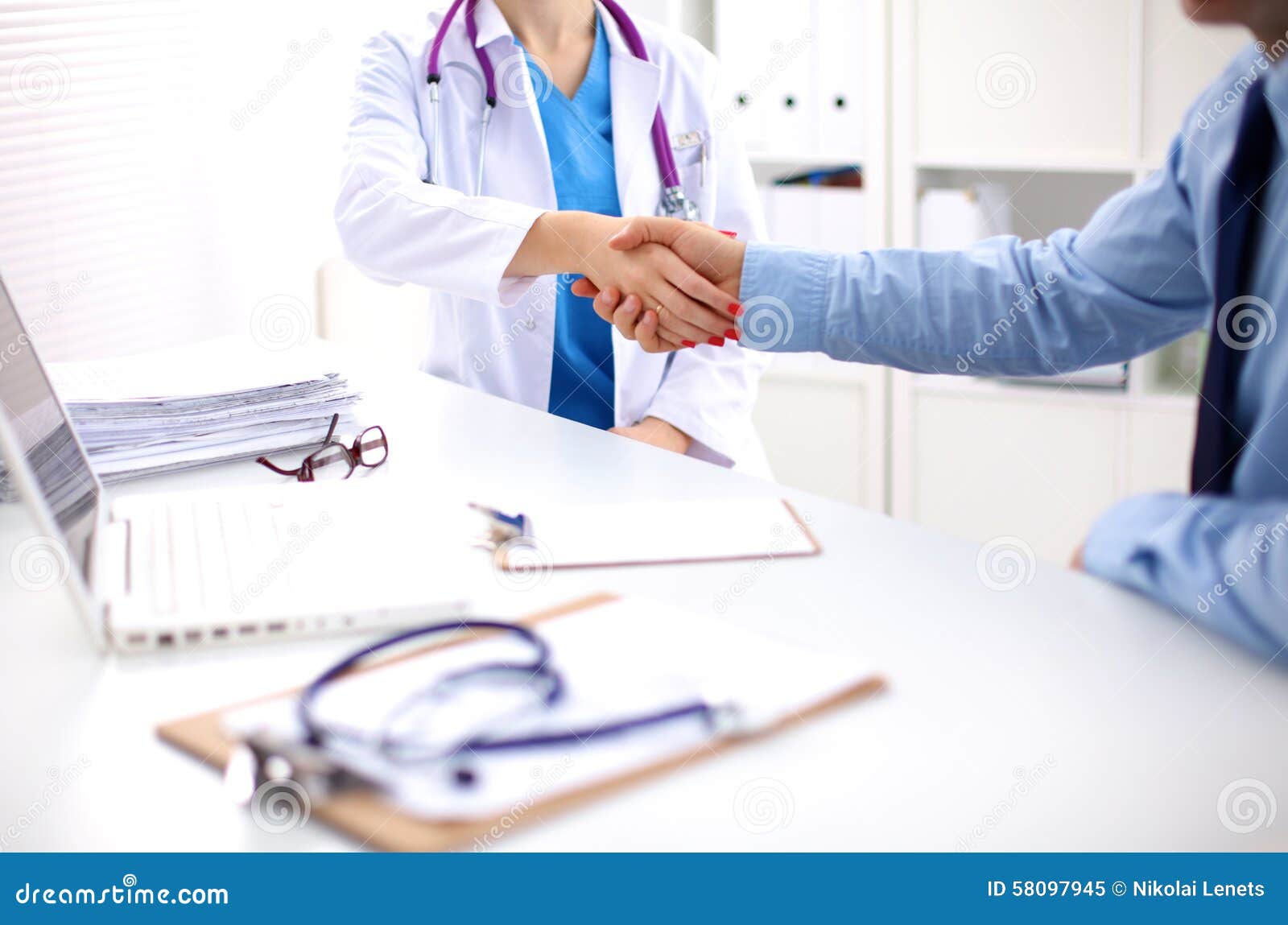 Doctor with Stethoscope on the Patient S Admission at the Table Stock ...