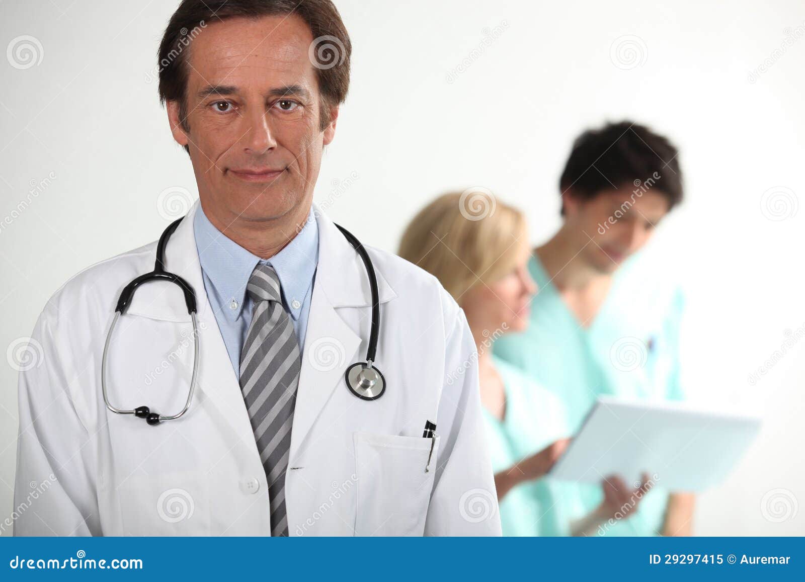 Doctor Stood with Colleagues Stock Image - Image of cure, sick: 29297415