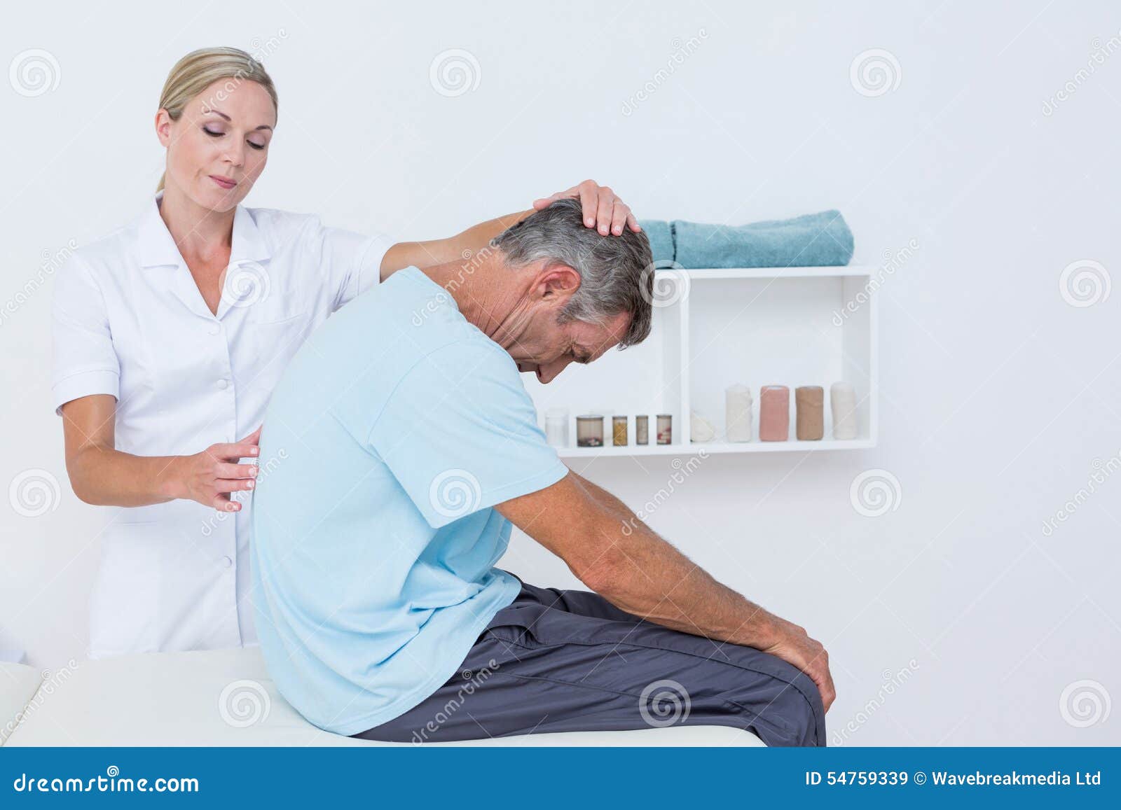 Doctor Stretching a Man Back Stock Image - Image of hands, muscles ...