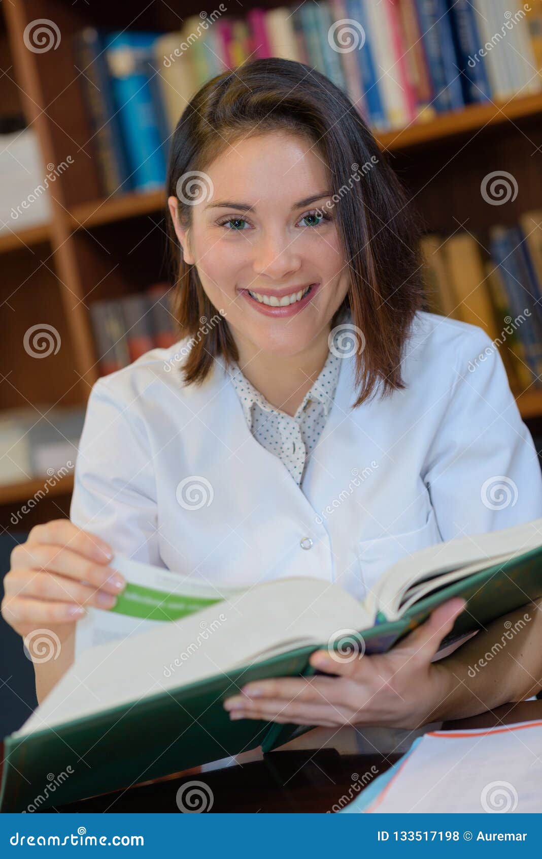 Doctor student in library stock photo. Image of paramedics - 133517198