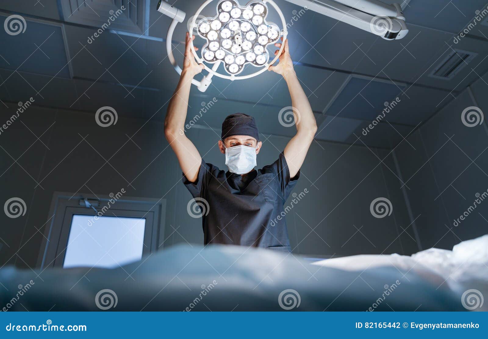 Doctor Surgeon in the Operating Room with Lamp Stock Photo - Image of ...