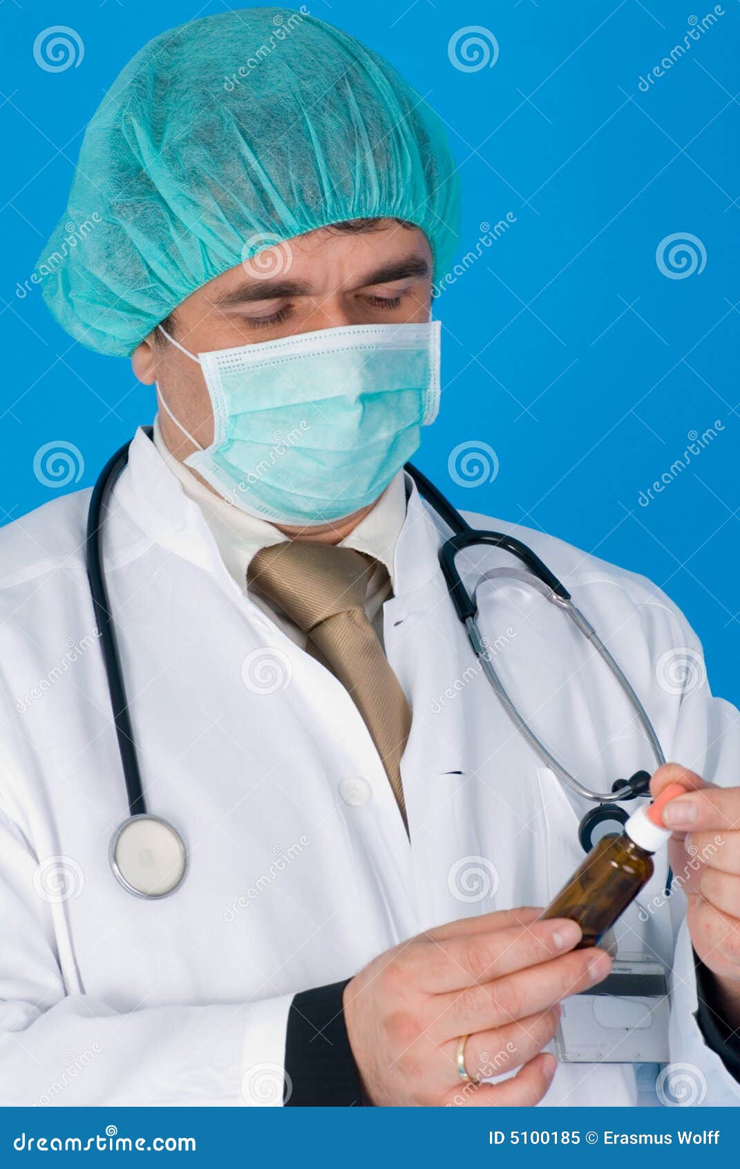 Doctor in surgical mask stock image. Image of bottle, doctor - 5100185