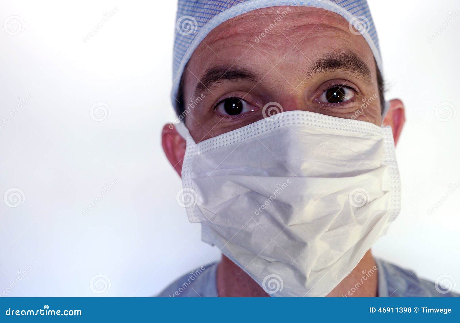 Doctor in Surgical Mask with Surprised Expression Stock Photo - Image ...