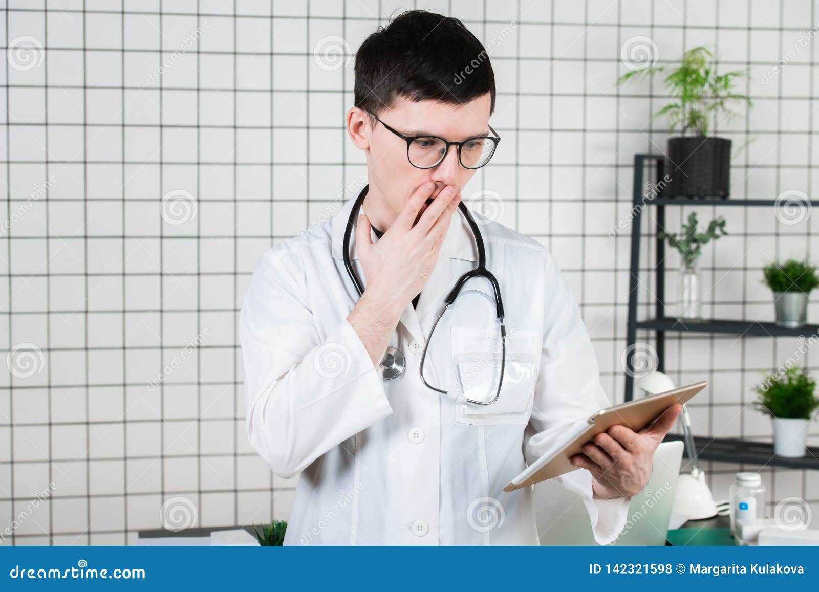 Doctor Surprised, Shocked from Notes on Tablet Stock Photo - Image of ...