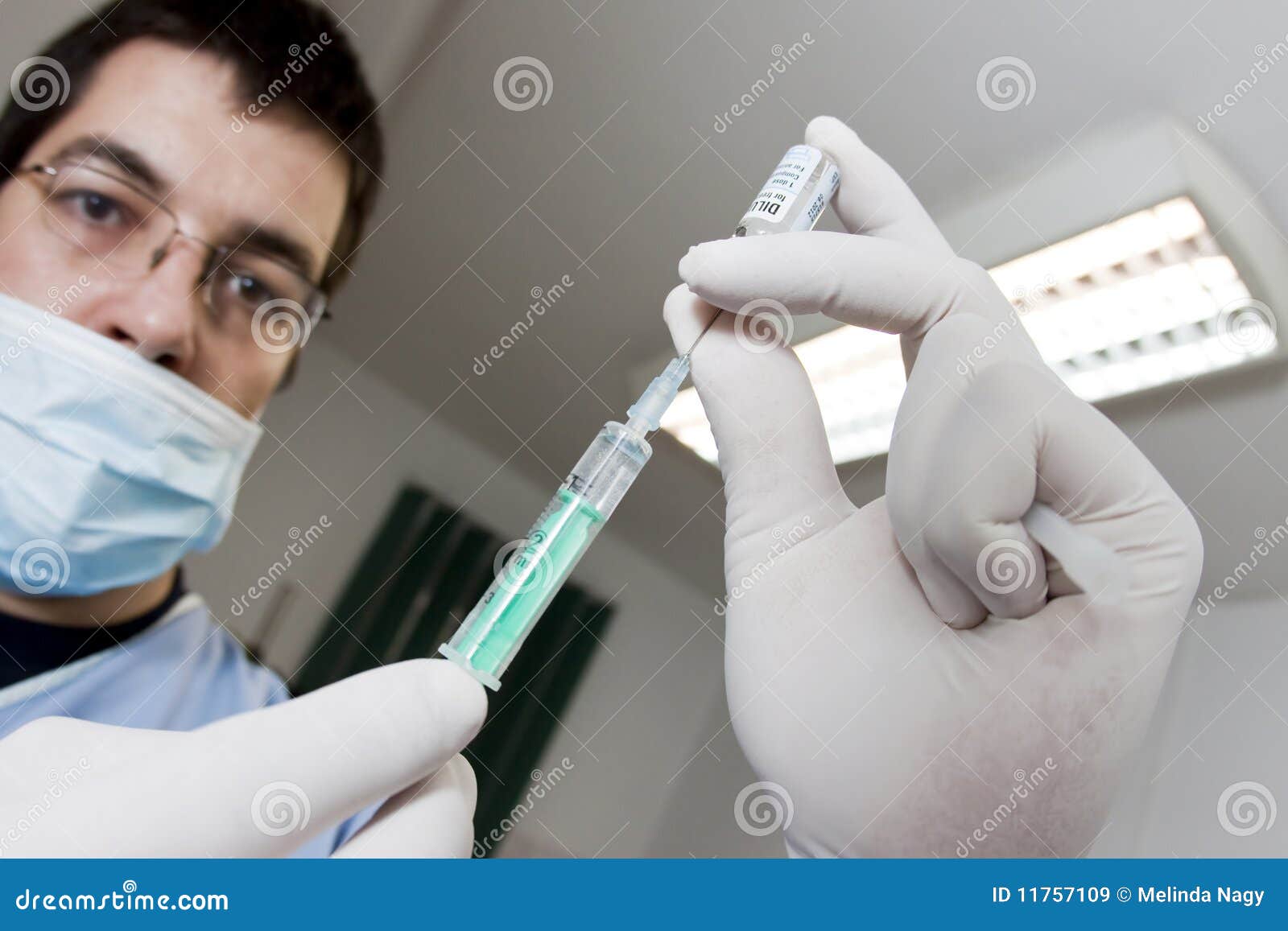 Doctor with syringe stock image. Image of h1n1, hospital - 11757109