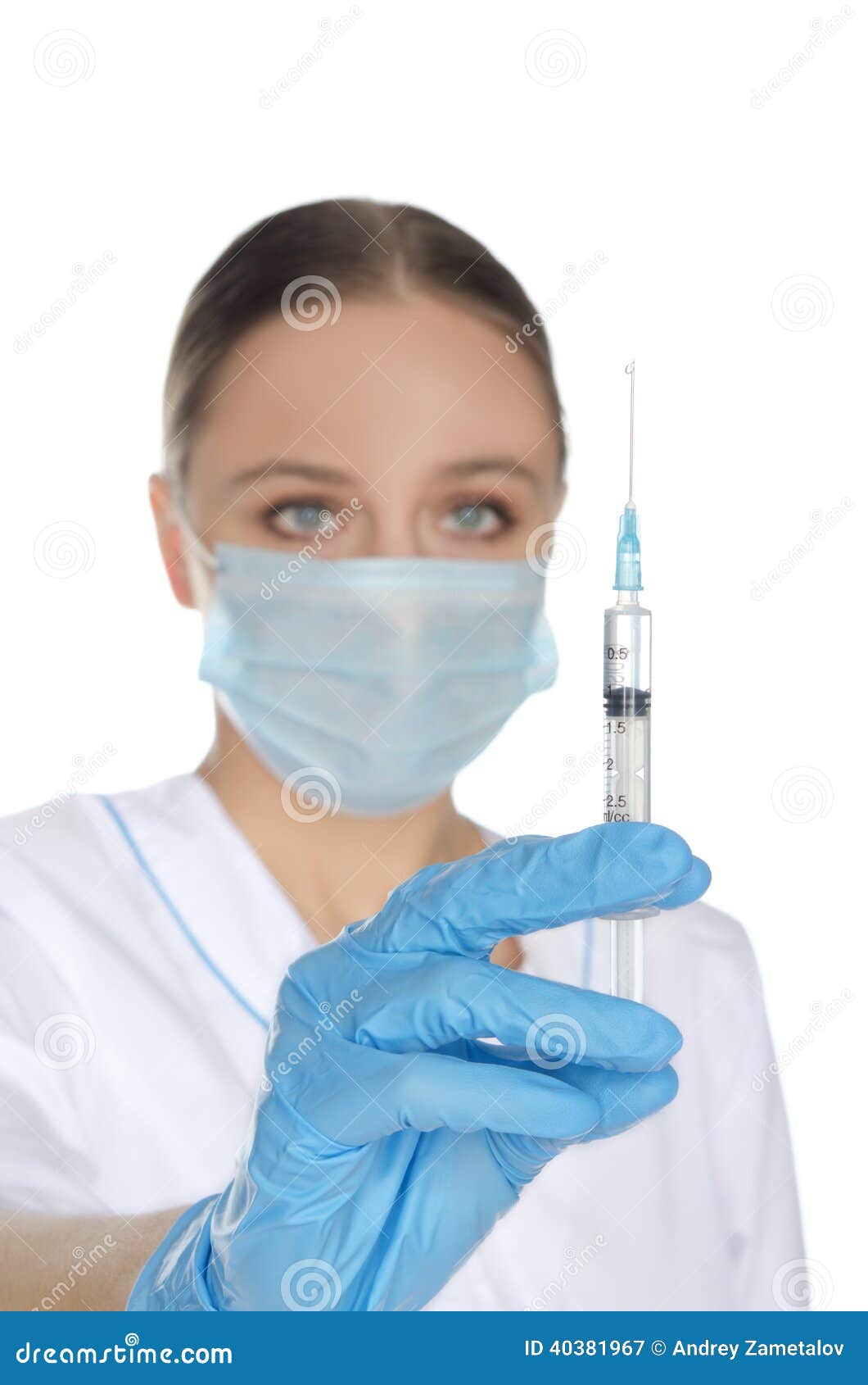 Doctor about a syringe stock image. Image of nurse, mask - 40381967