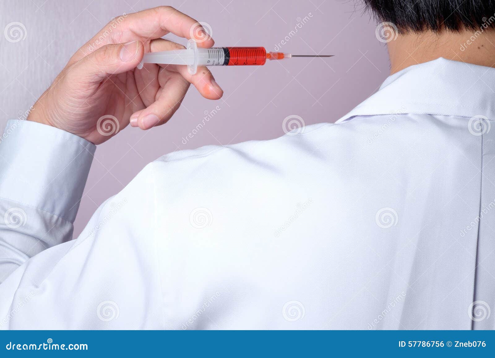 Doctor with syringe stock photo. Image of healthcare - 57786756