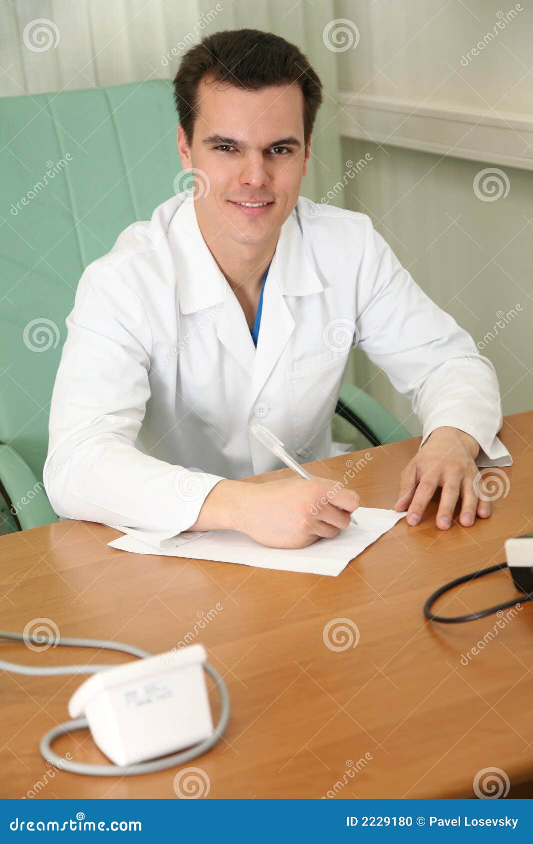Doctor at the table stock photo. Image of pockets, portrait - 2229180